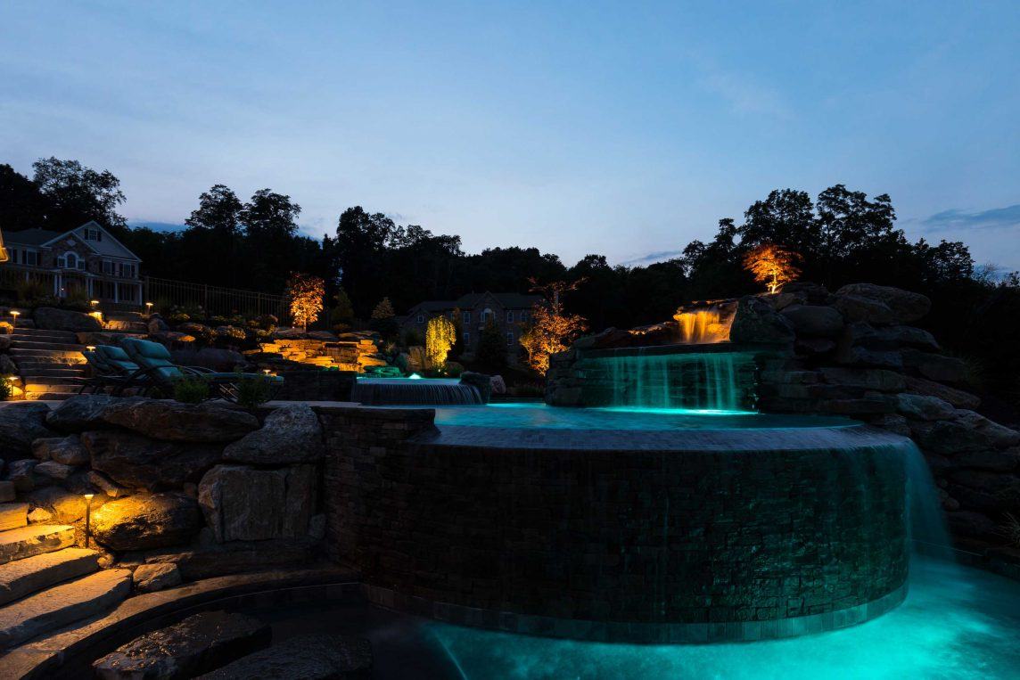 Infinity Edge Pool with Sun Ledge, Grotto, Waterfall and Floating Steps ...